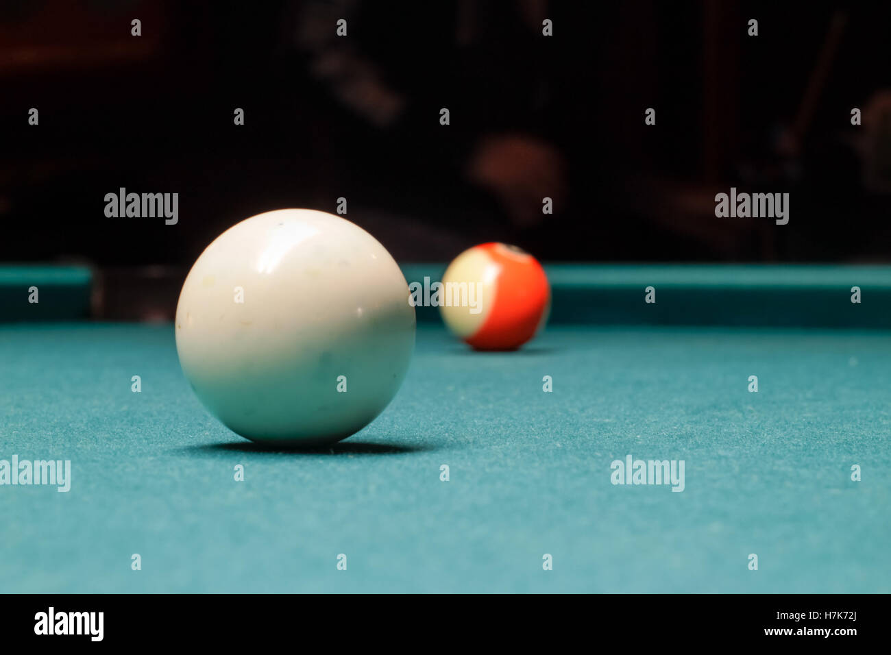 Photograph of some billiards plastic balls on table Stock Photo - Alamy