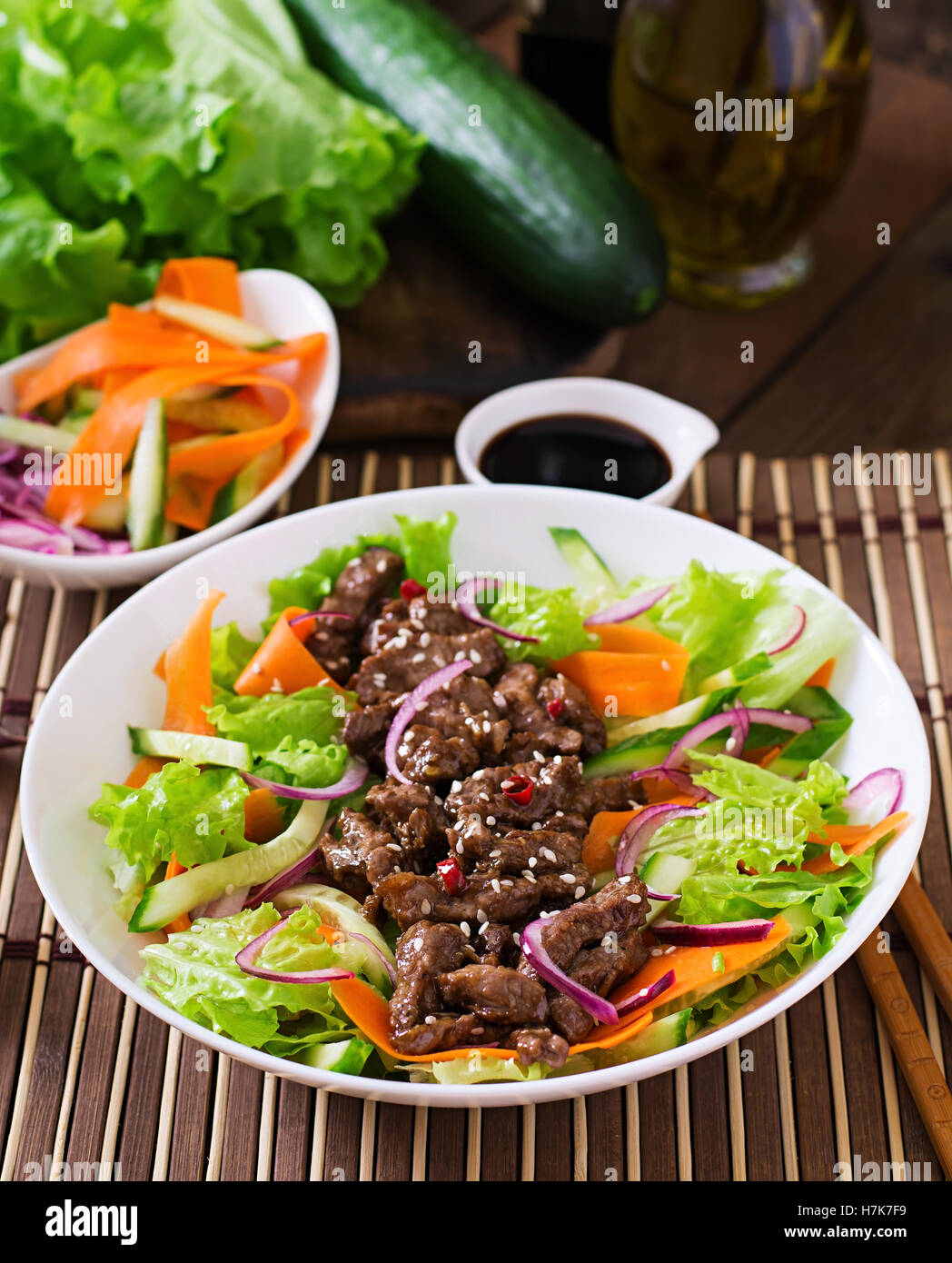 Salad with beef teriyaki Stock Photo - Alamy