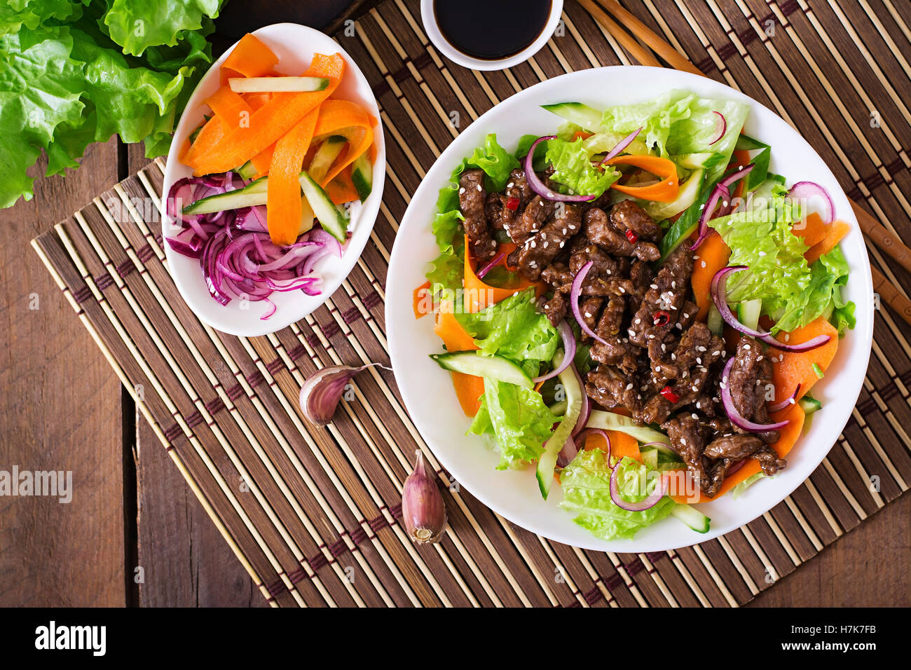 Salad with beef teriyaki. Top view Stock Photo - Alamy