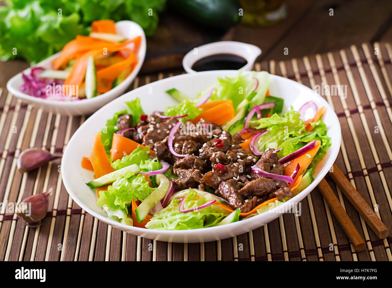 Salad with beef teriyaki Stock Photo - Alamy