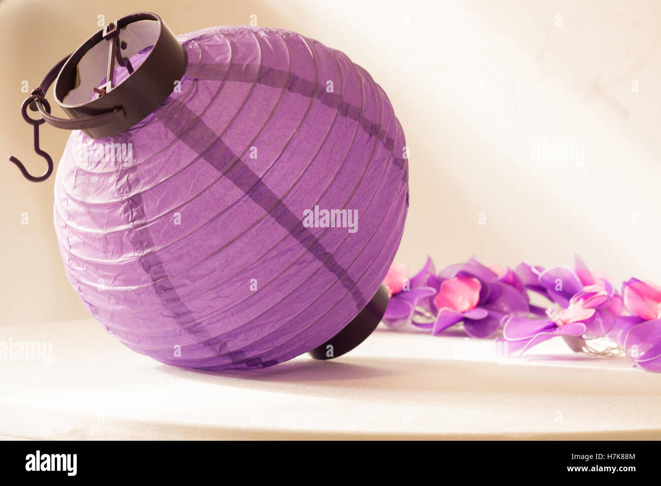 Purple lanterns as party decorations Stock Photo - Alamy