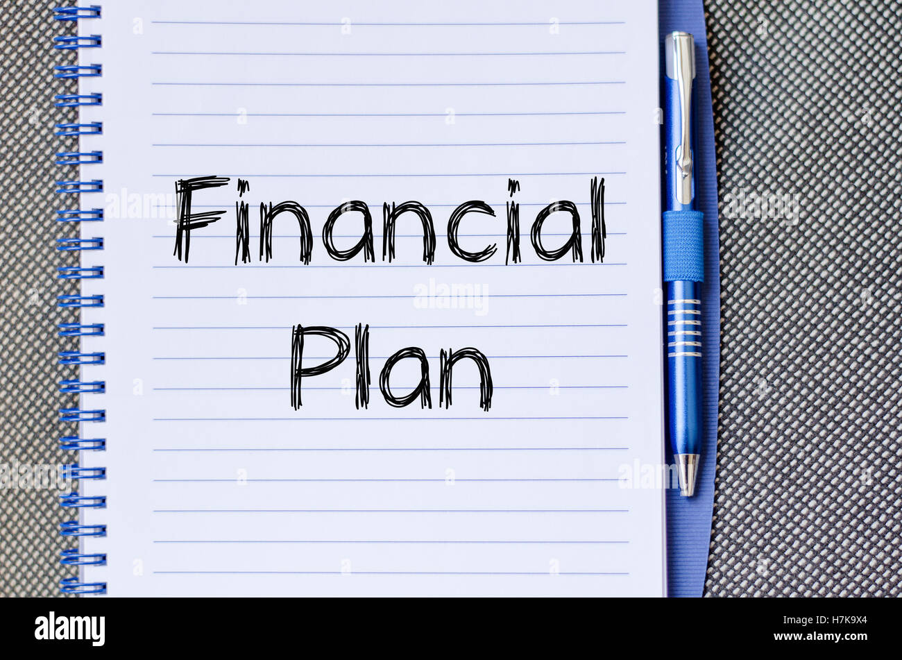 Financial plan text concept write on notebook Stock Photo - Alamy