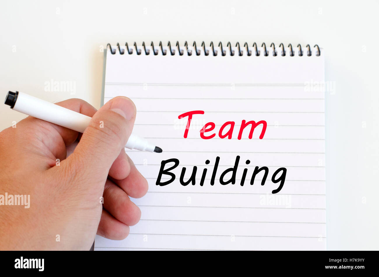 Team building text concept write on notebook Stock Photo - Alamy