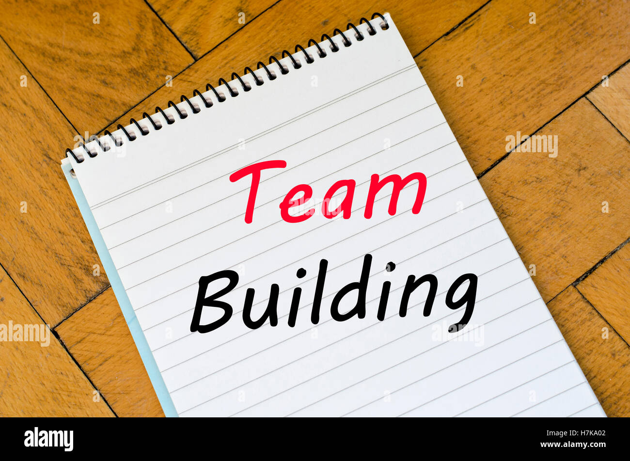 Team building text concept write on notebook Stock Photo - Alamy