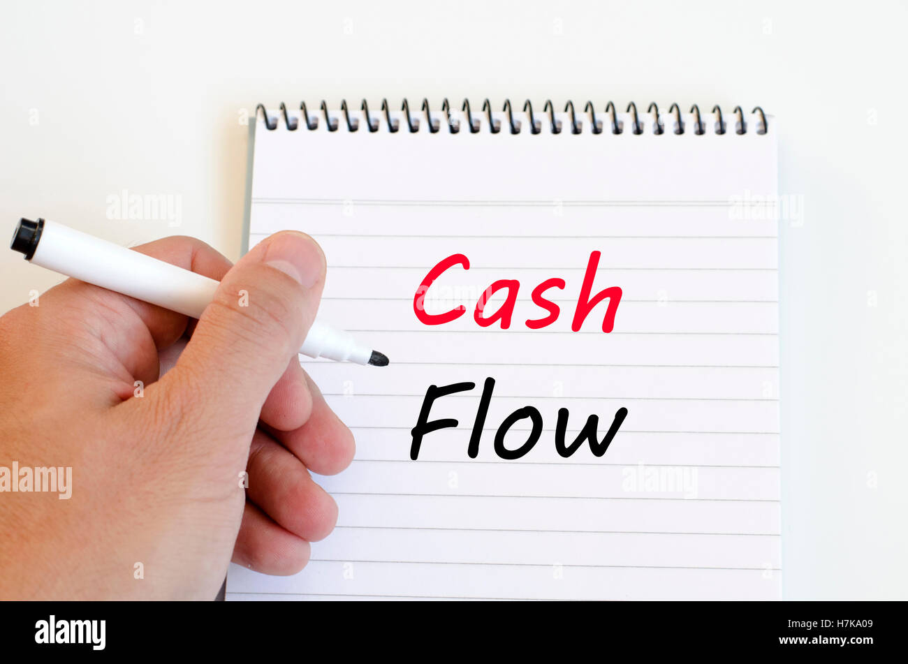 Cash flow text concept write on notebook Stock Photo - Alamy