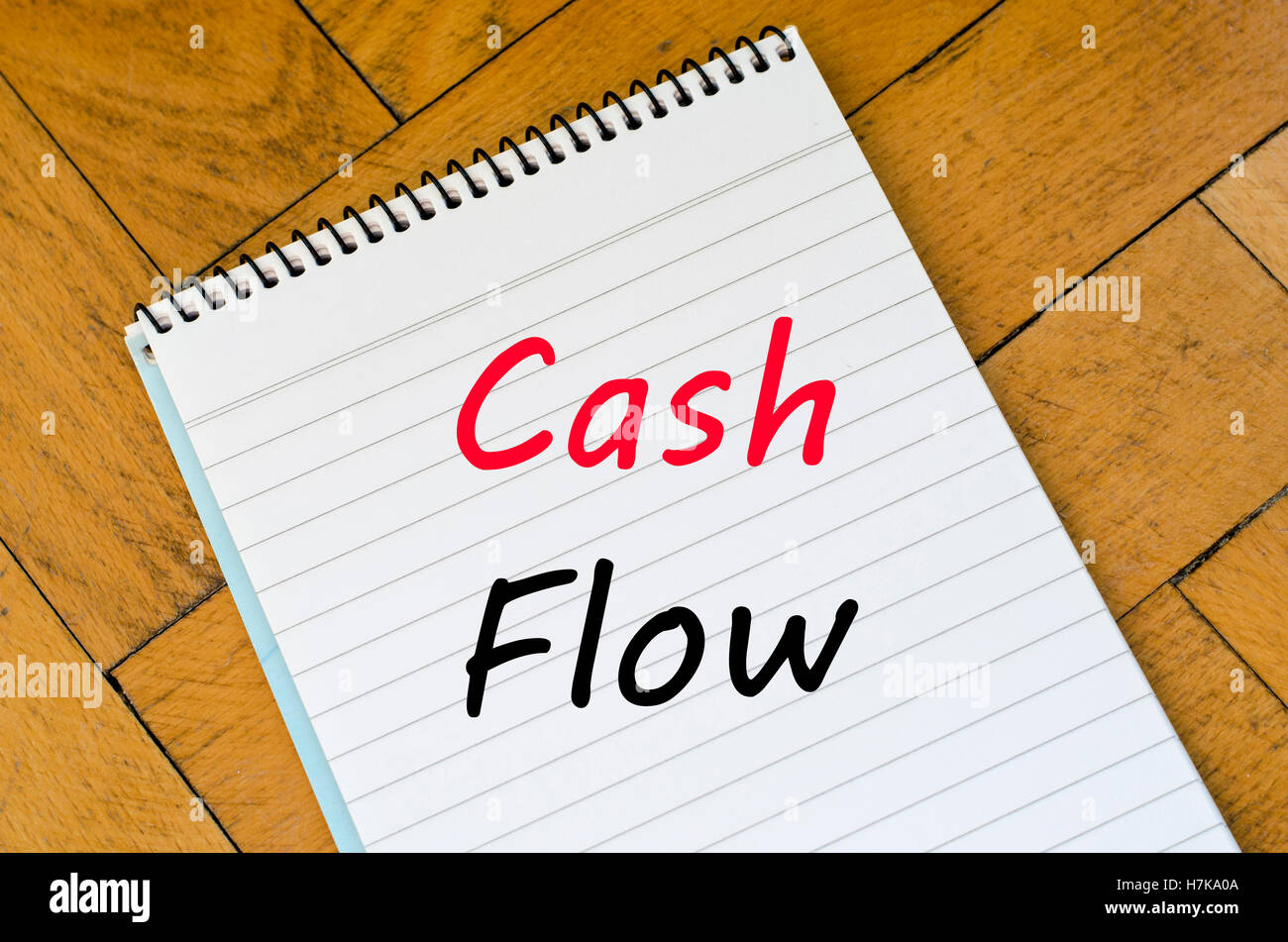 Cash flow text concept write on notebook Stock Photo - Alamy