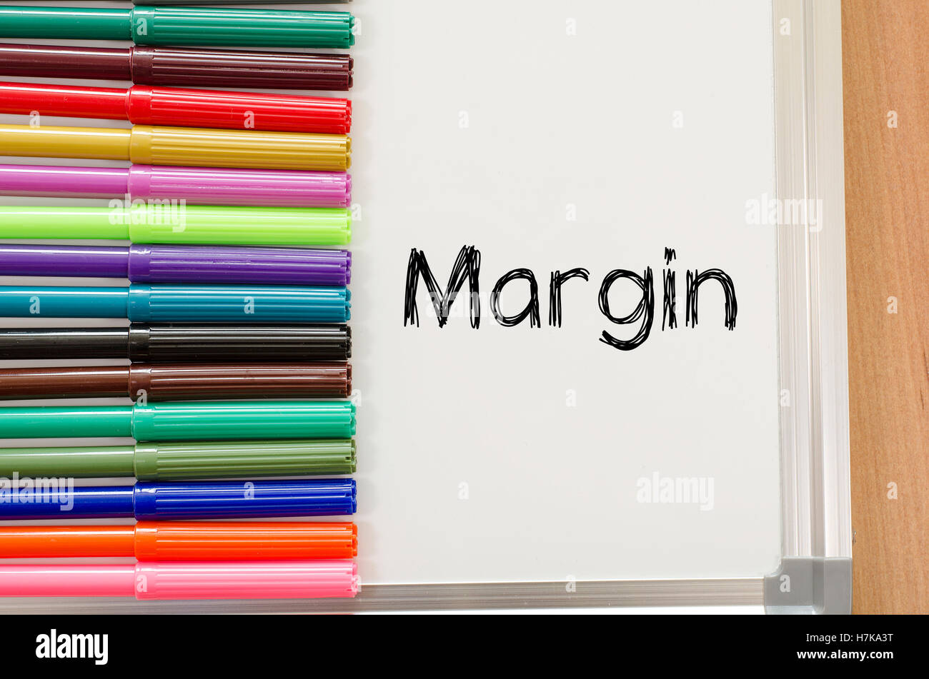 Margin text concept over whiteboard background Stock Photo - Alamy