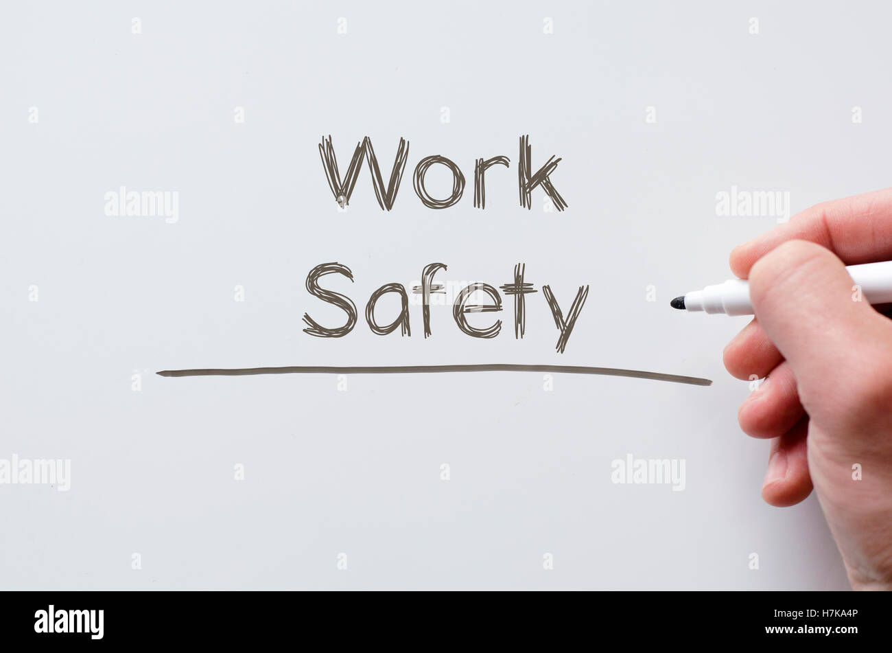 Human hand writing work safety on whiteboard Stock Photo - Alamy