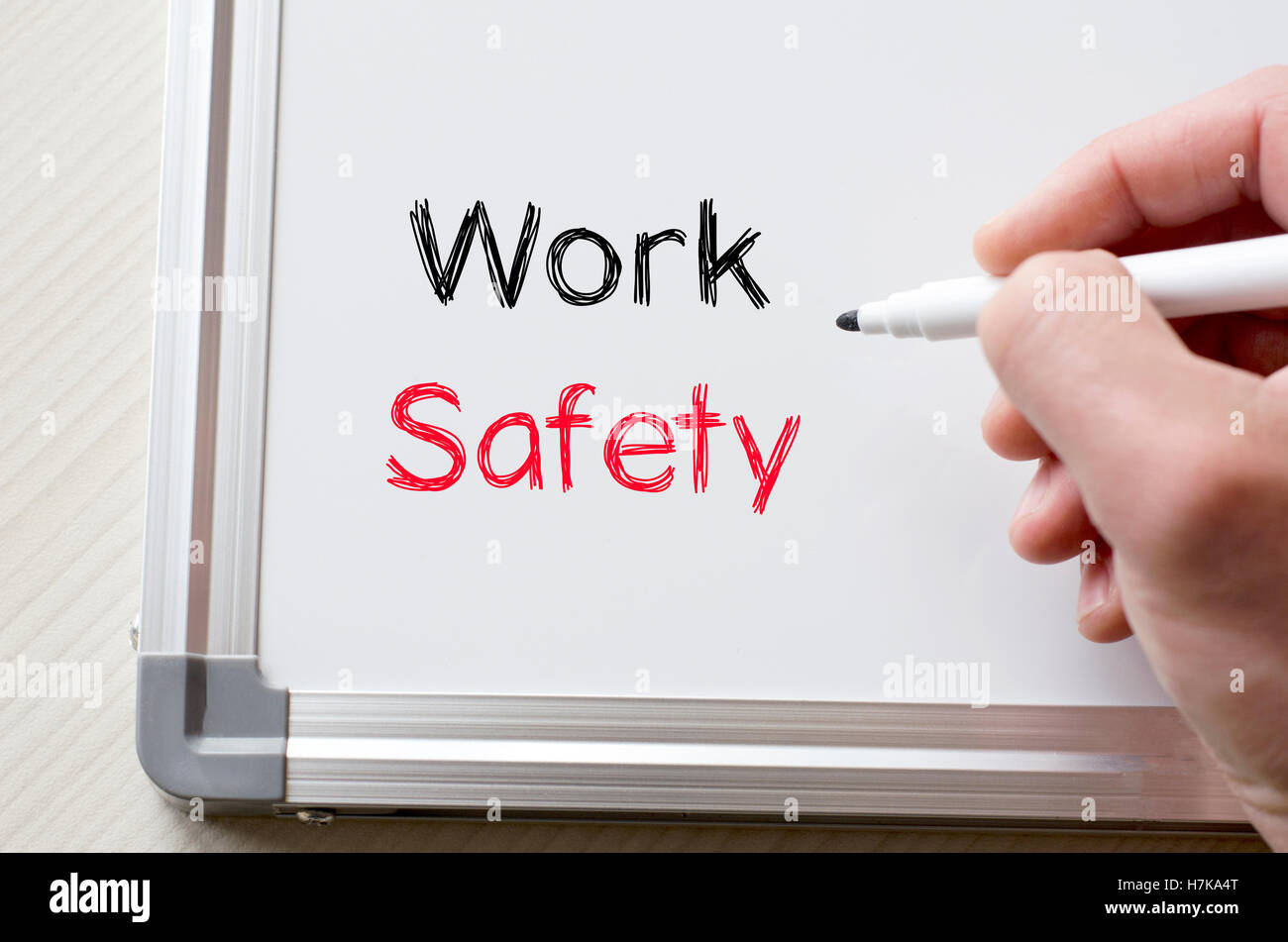 Human hand writing work safety on whiteboard Stock Photo - Alamy