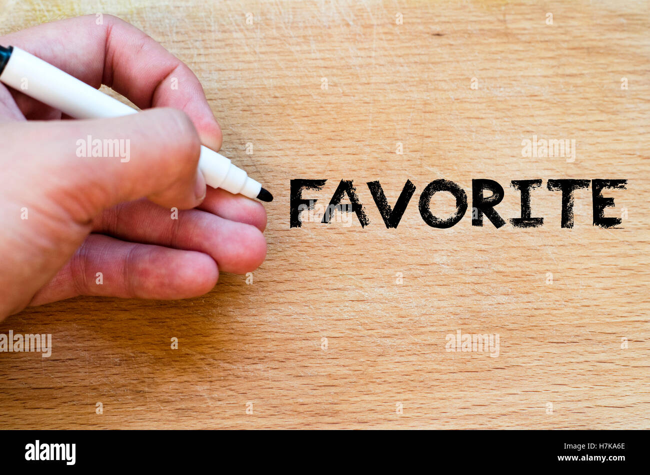 Human hand over wooden background and favorite text concept Stock Photo ...