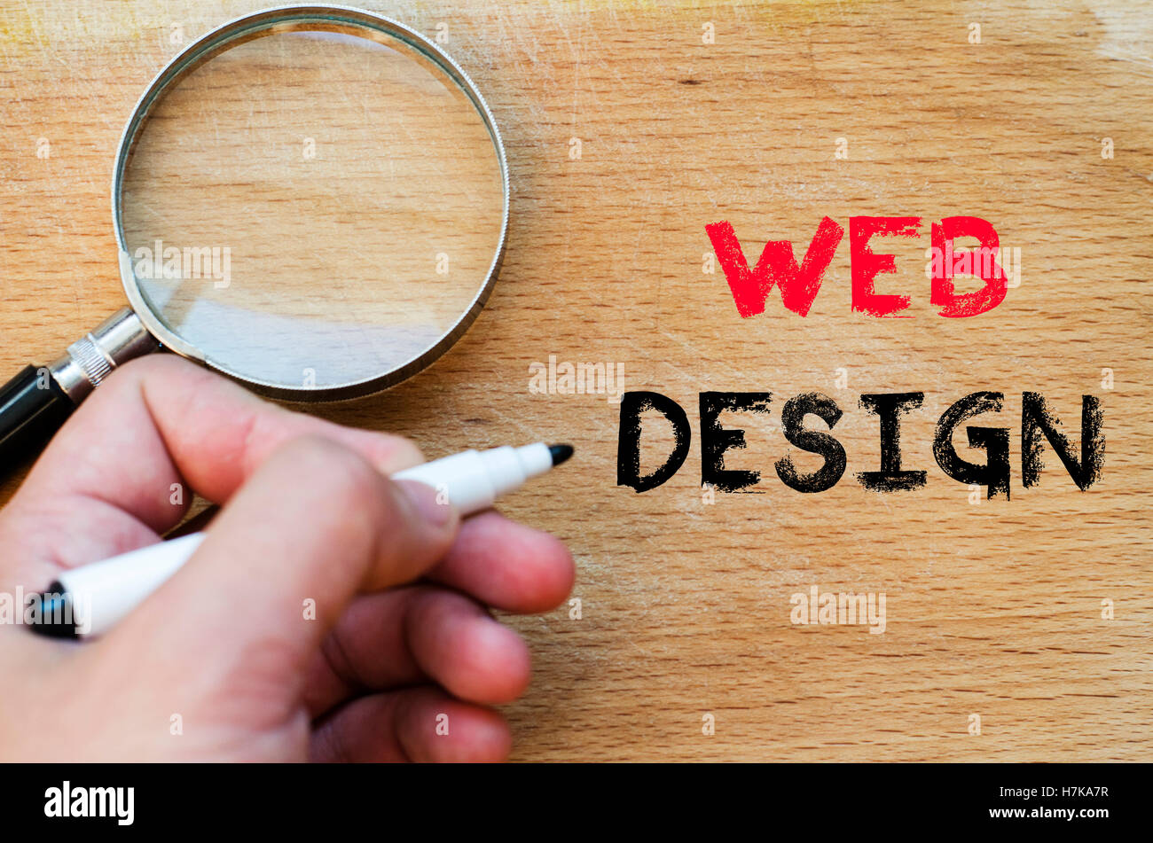 Human hand over wooden background and web design text concept Stock ...