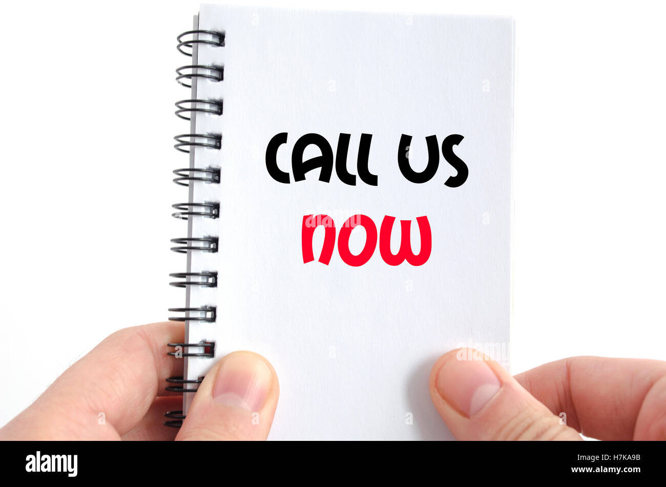 Call us now text concept isolated over white background Stock Photo - Alamy