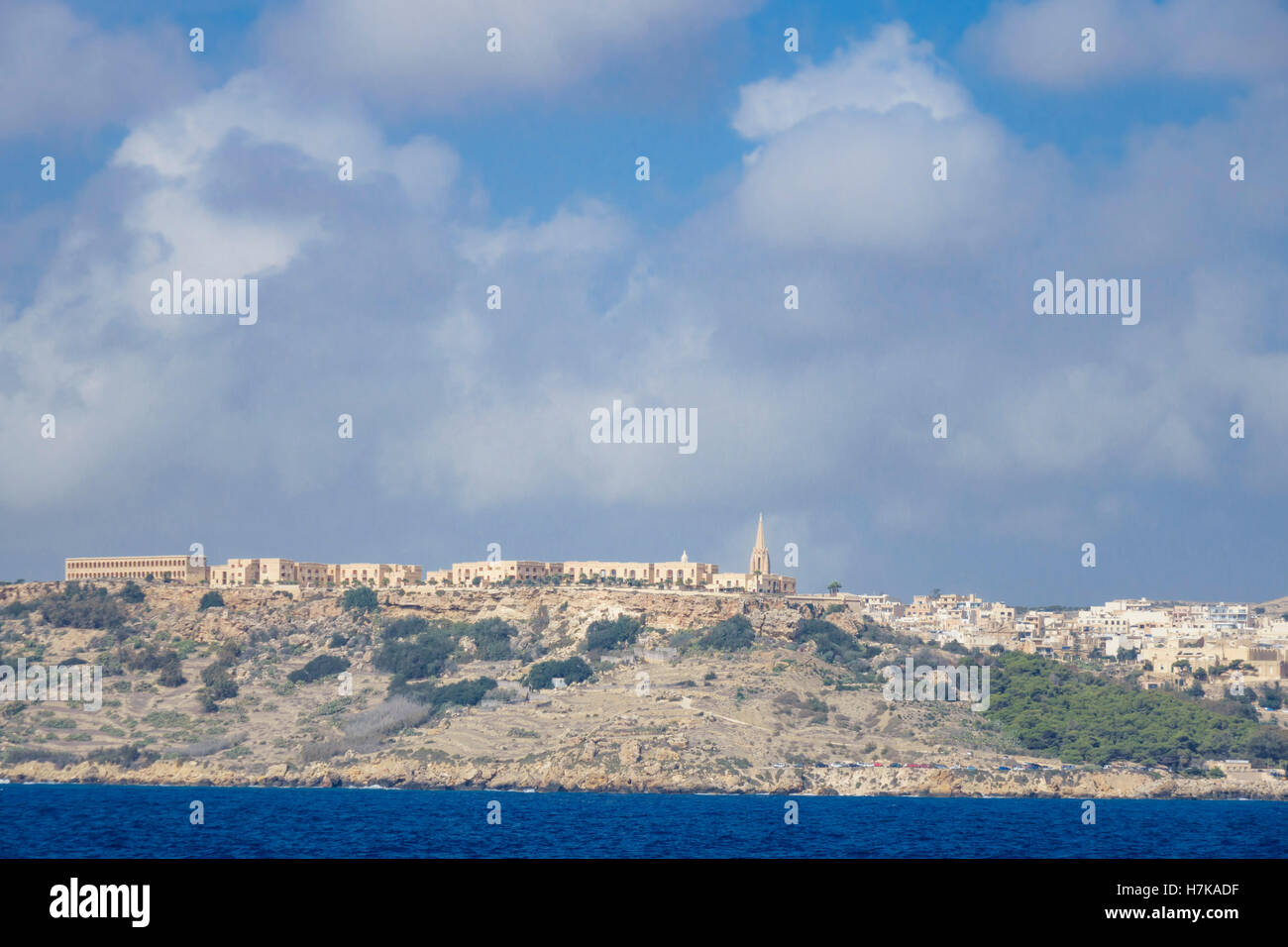 Ghajnsielem Parish Church spire and town seen from the Malta to Gozo ...