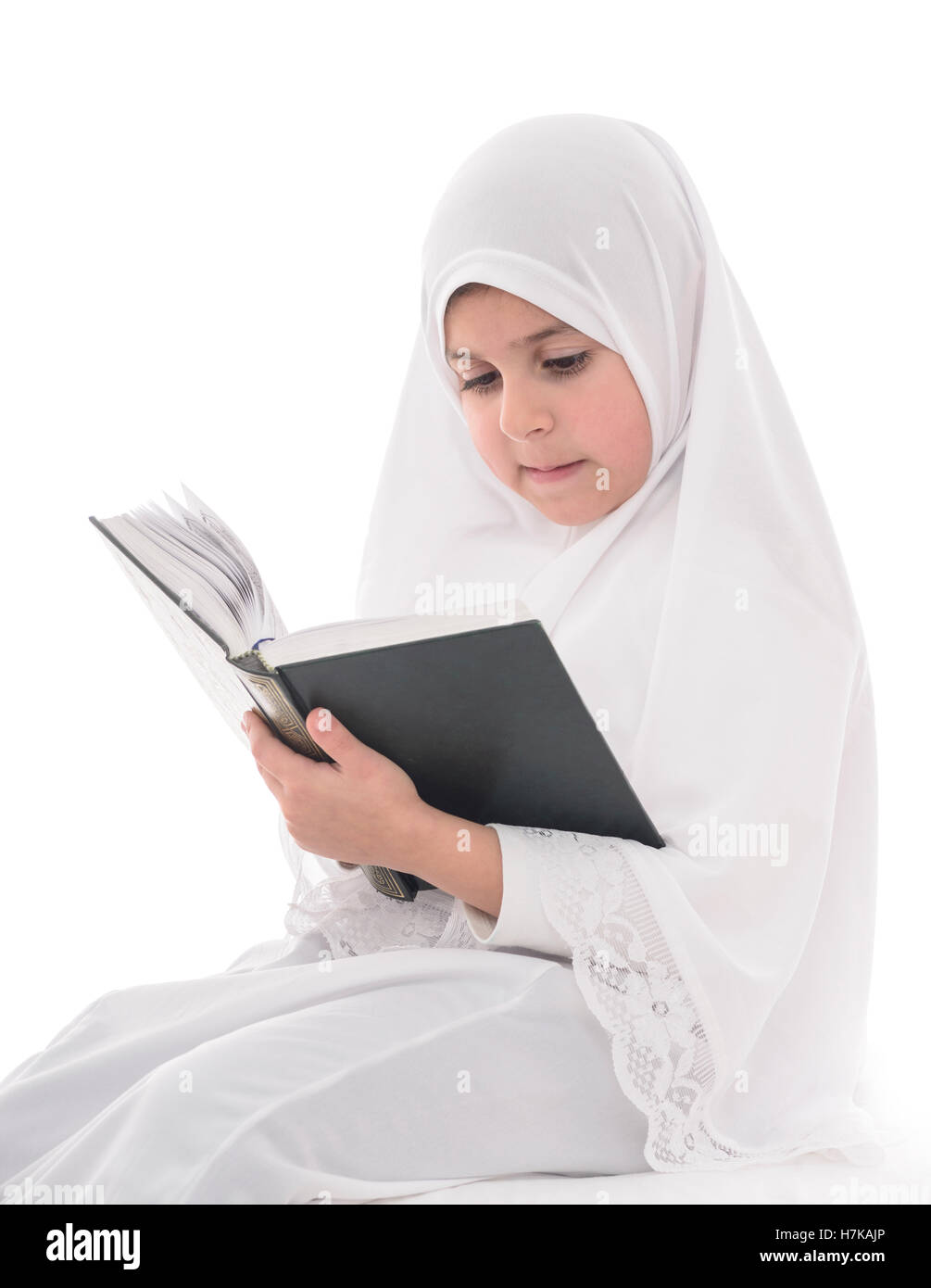Little Young Muslim Girl Reading Quran Book Isolated on White ...