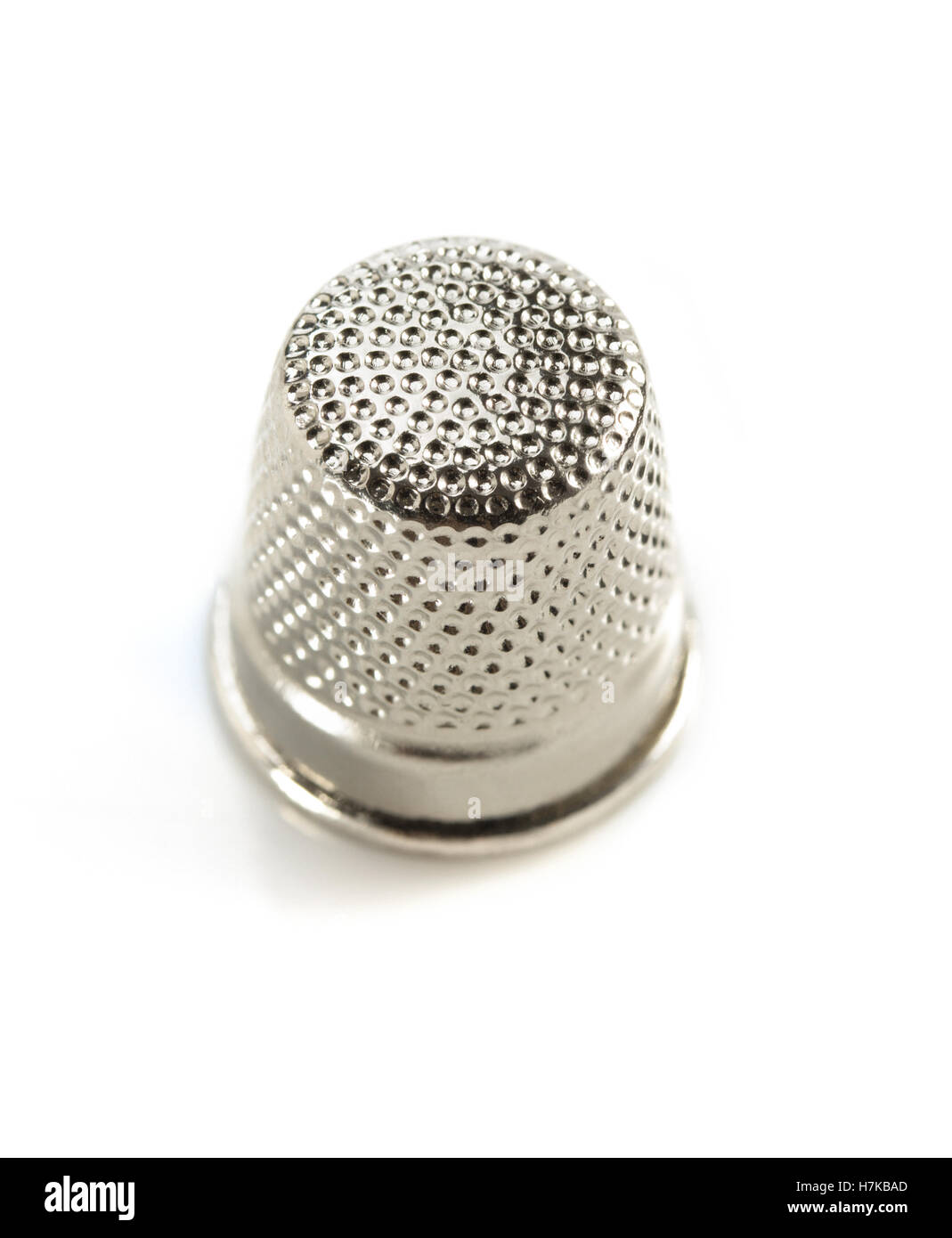 sewing thimble isolated on white background Stock Photo - Alamy