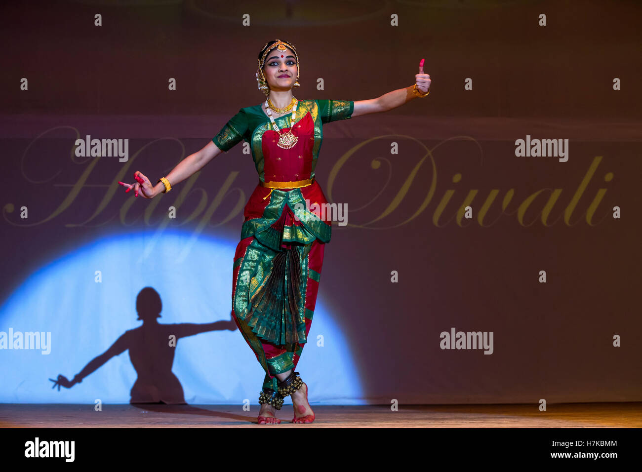 Indian girl is dancing the national clothes during the celebration of ...