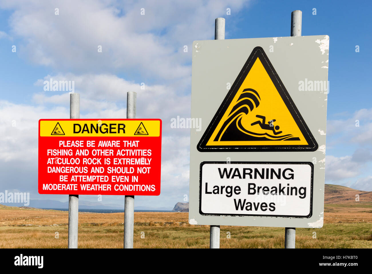 Danger, large breaking waves sign. Culoo Rock, Valentia Island, County ...