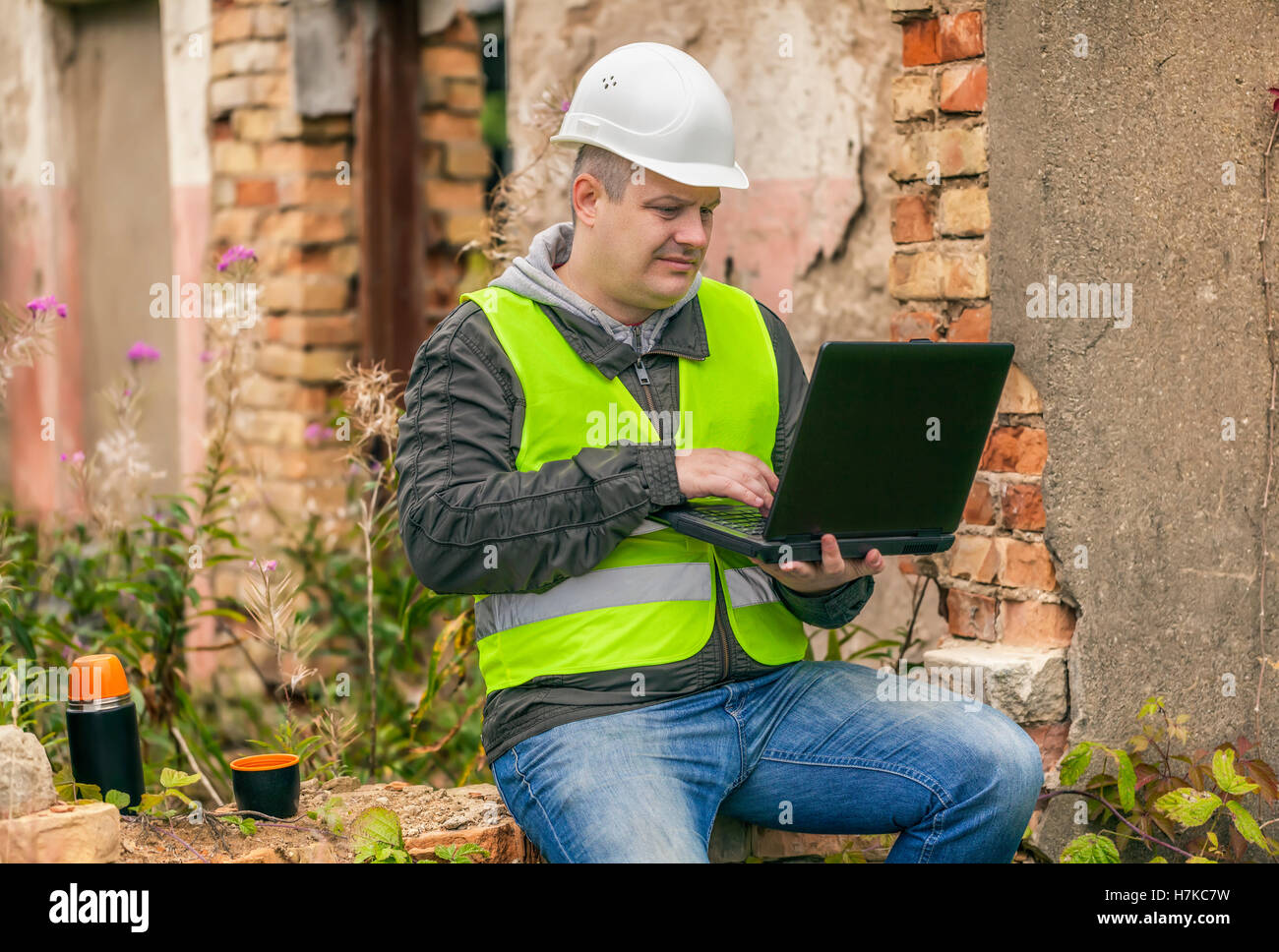 Construction Engineer working with PC Stock Photo - Alamy