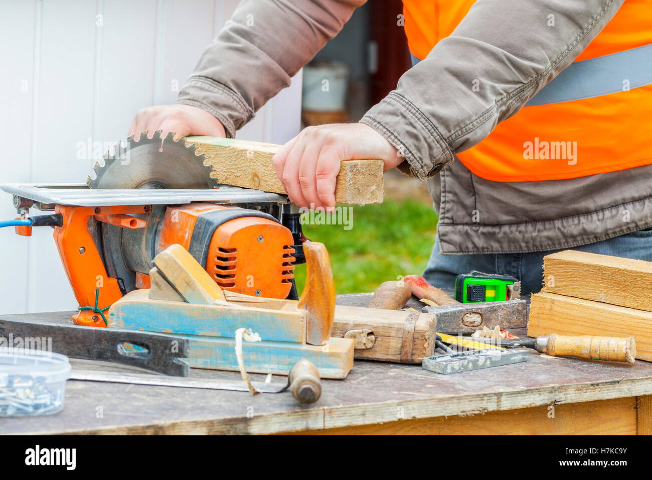Carpenter sawing timber Stock Photo - Alamy