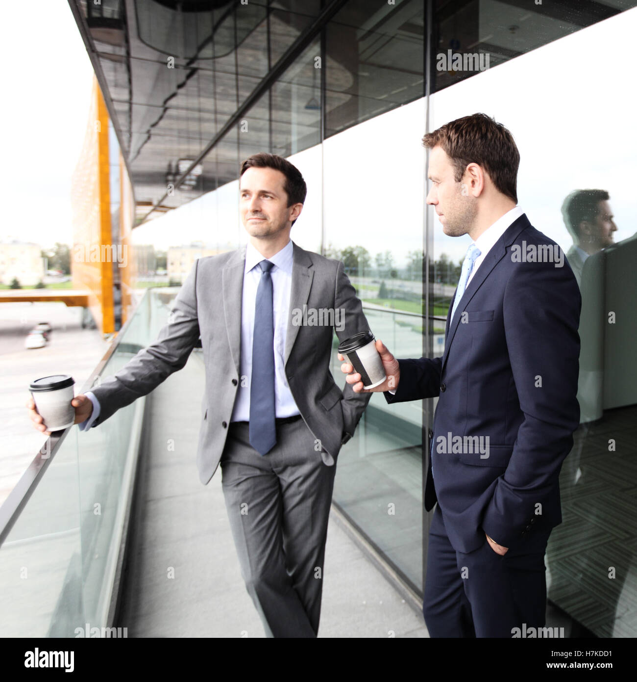 Two people talking on balcony hi-res stock photography and images - Alamy