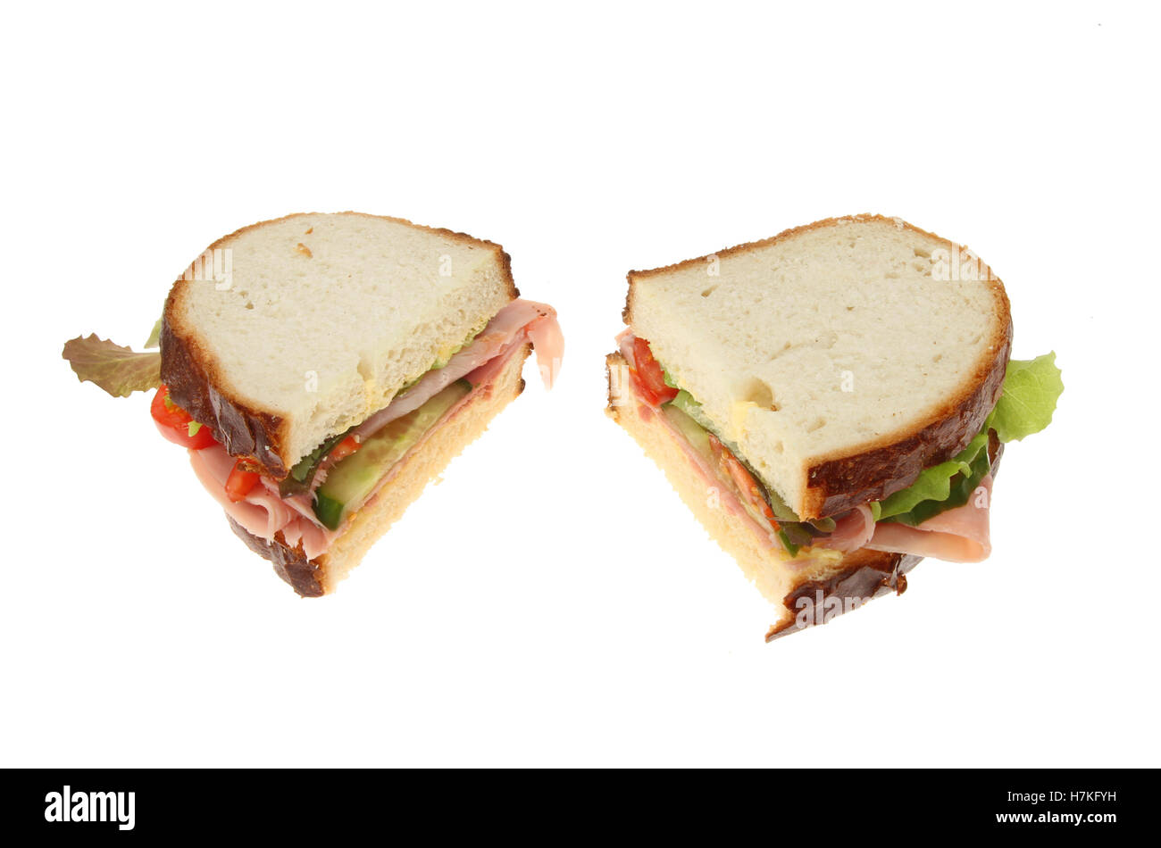 Two ham salad sandwich halves isolated against white Stock Photo - Alamy