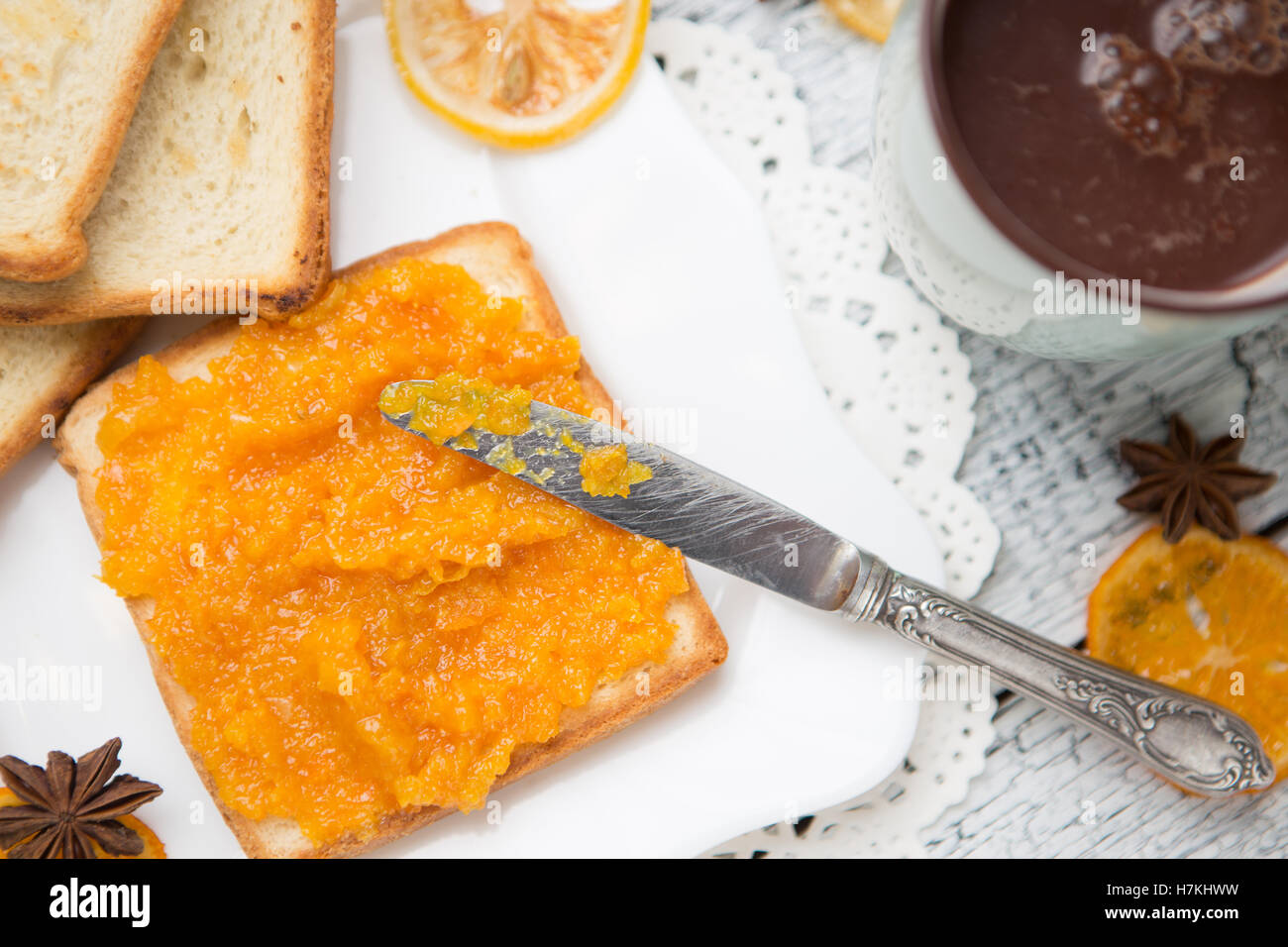 toast bread with jam on vintage wooden table Stock Photo - Alamy