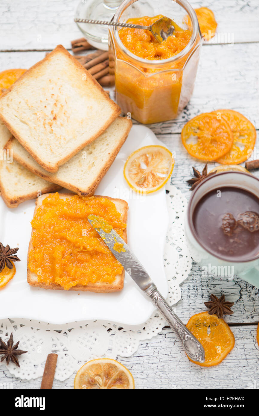 toast bread with jam on vintage wooden table Stock Photo - Alamy
