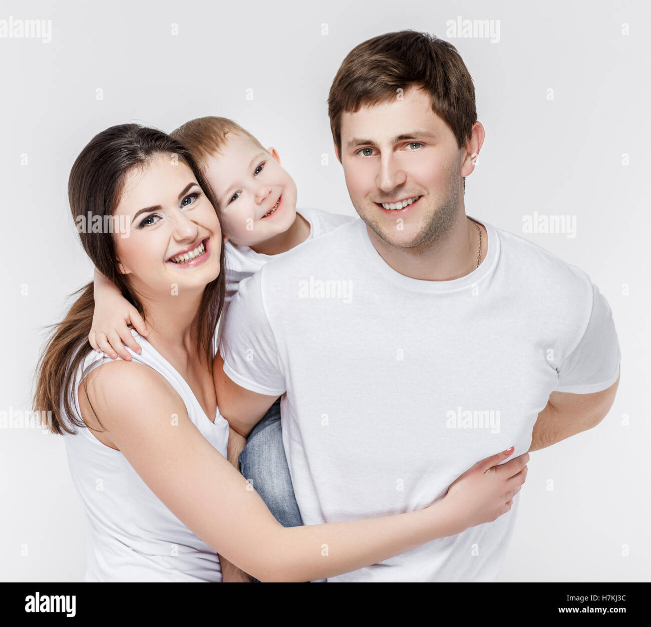 happy family on grey background Stock Photo - Alamy
