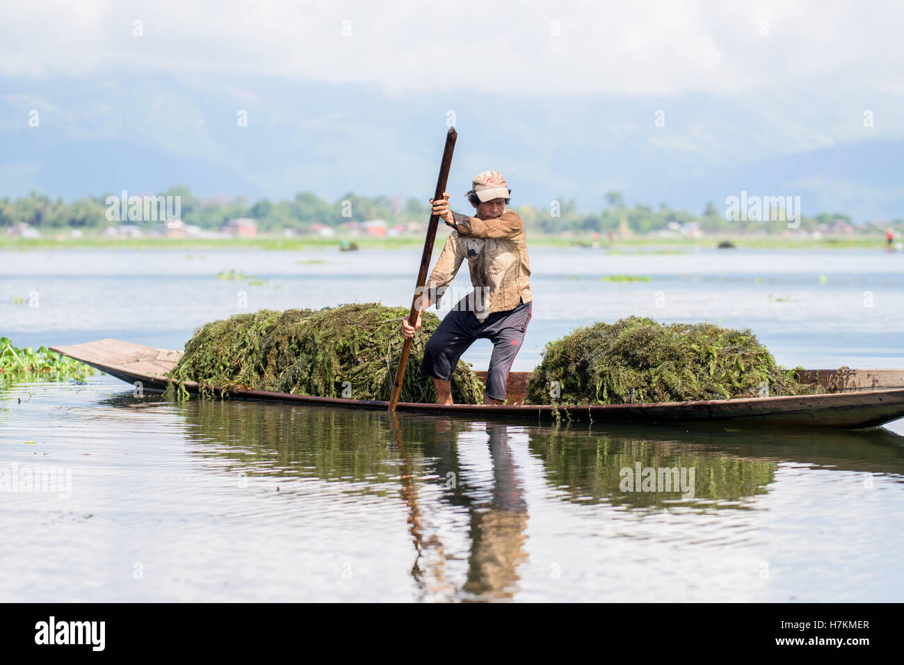 Inle Lake fisherman on a boat Stock Photo - Alamy