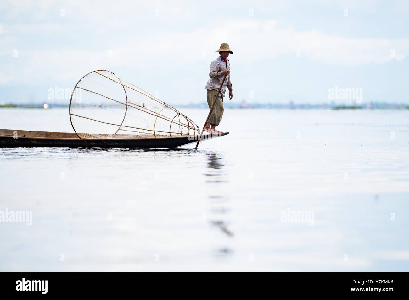 Inle Lake fisherman on a boat Stock Photo - Alamy