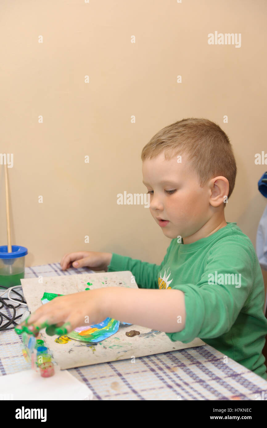 Boy table work hi-res stock photography and images - Alamy
