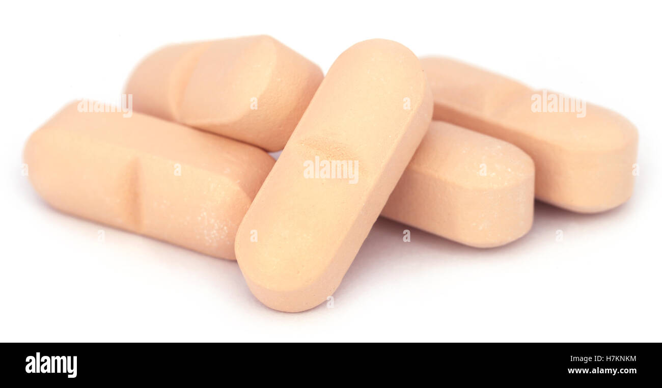 Tablets over white background Stock Photo - Alamy