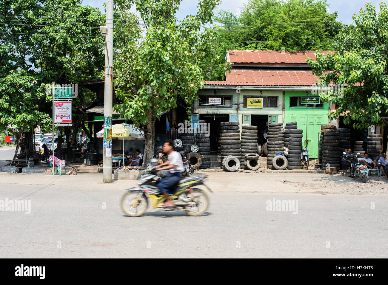 People on motorcycles in streets of Mandalay, Burma Stock Photo - Alamy