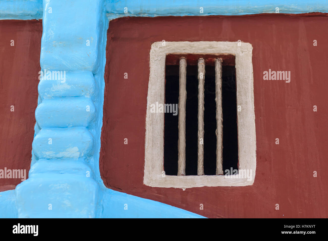 Open window with metal bars in a blue frame Stock Photo - Alamy