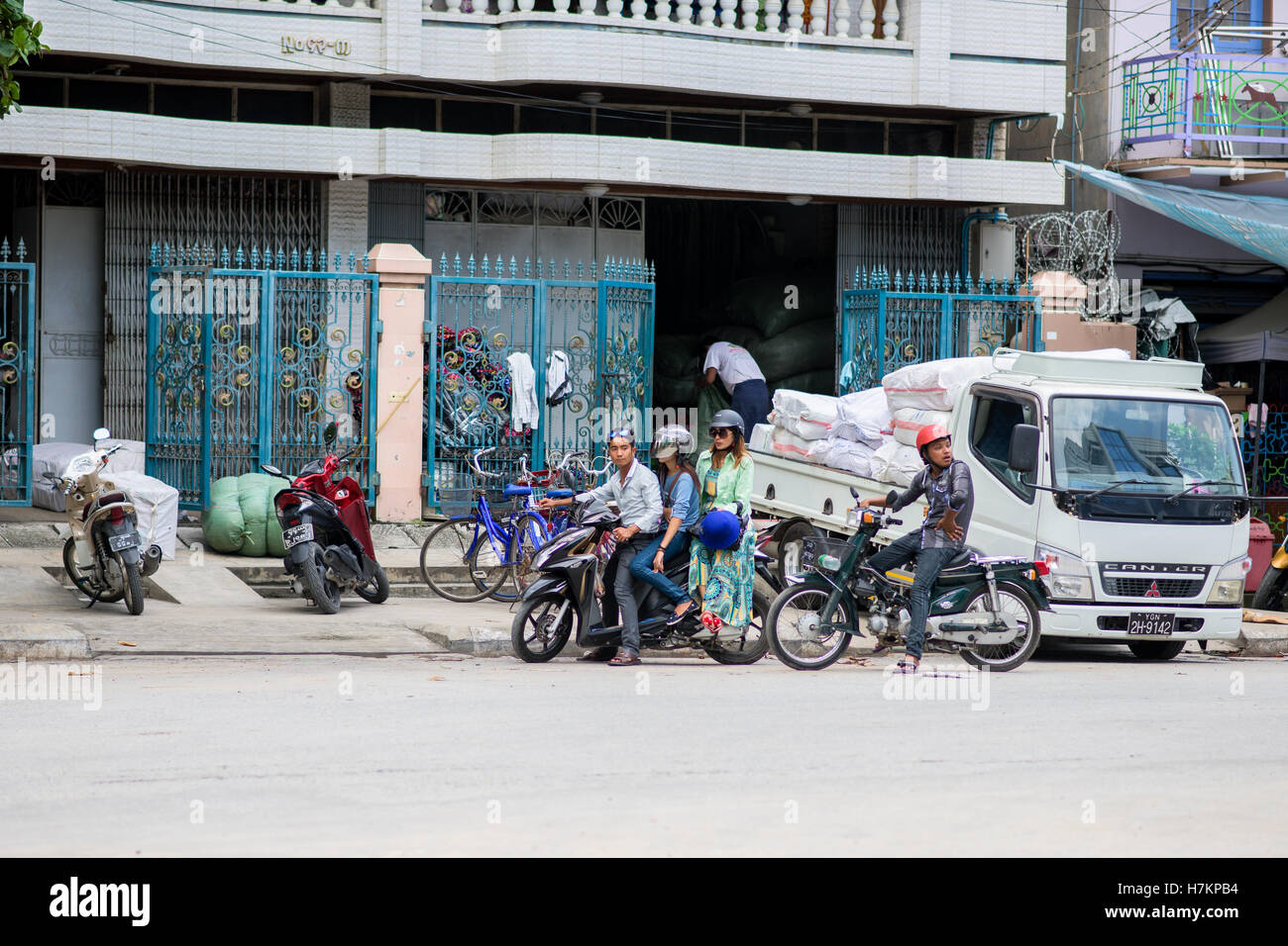 People on motorcycles in streets of Mandalay, Burma Stock Photo - Alamy