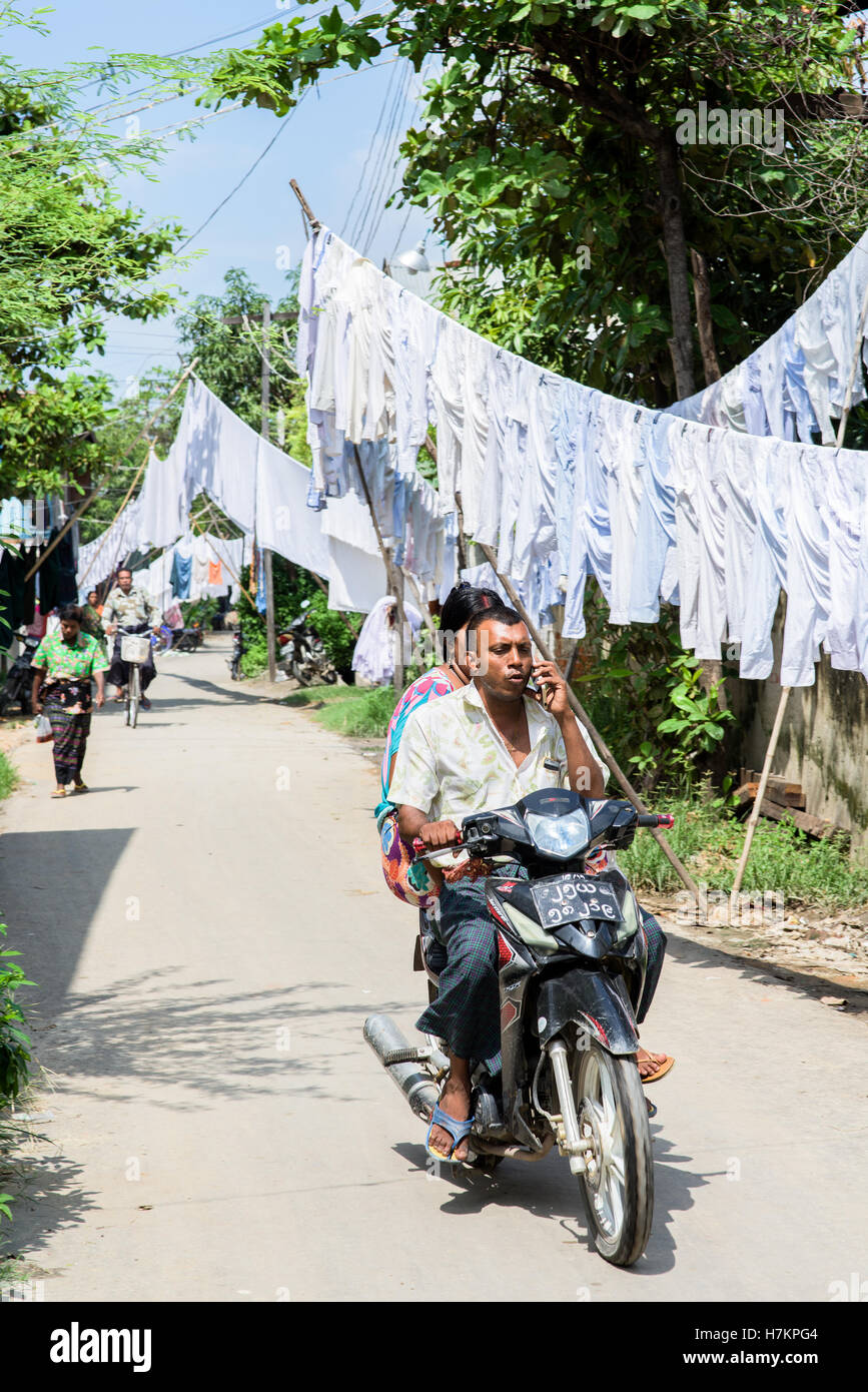 People on motorcycles in streets of Mandalay, Burma Stock Photo - Alamy