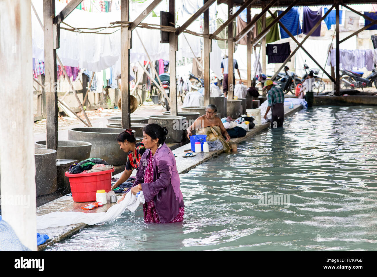 Indian women washing clothes hi-res stock photography and images - Alamy