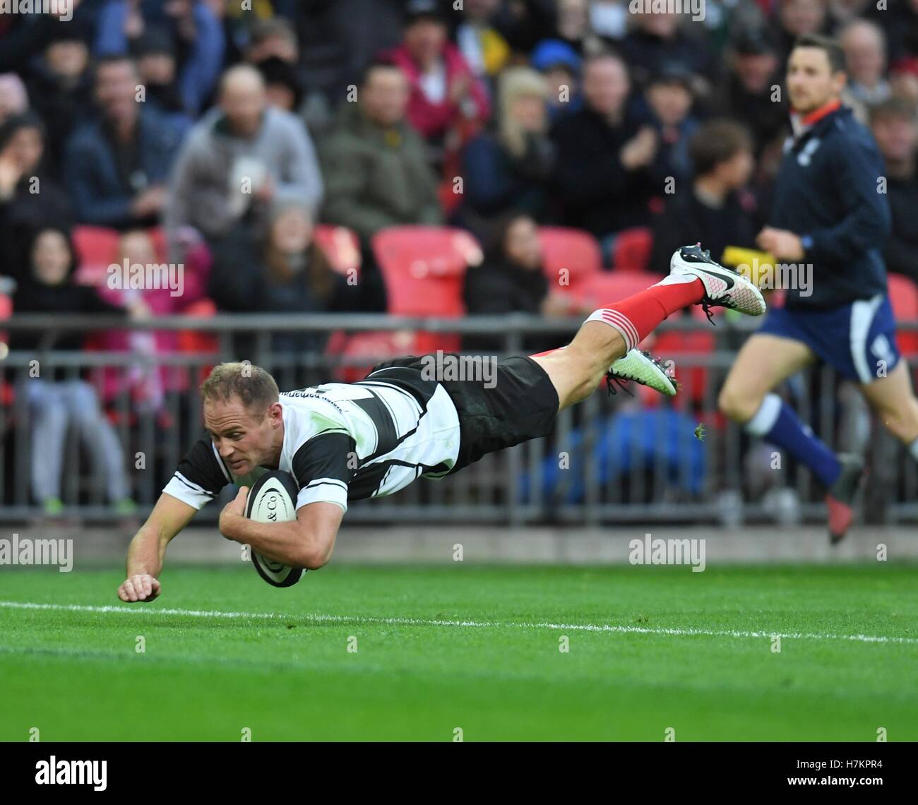 action during the Killik Cup match between the Barbarians and South ...