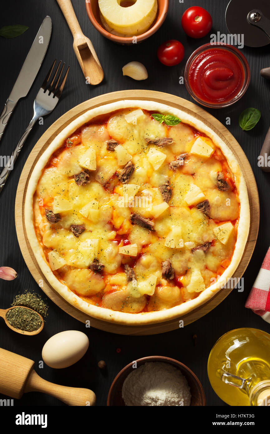 italian pizza at table background Stock Photo - Alamy