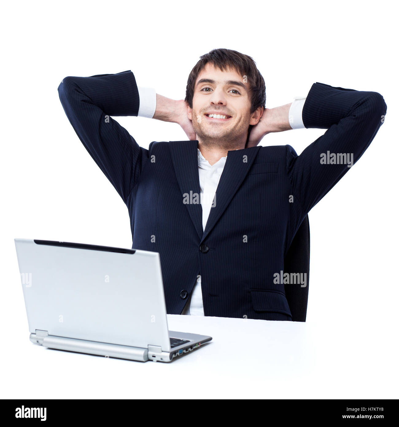 Laptop sitting on table Cut Out Stock Images & Pictures - Alamy