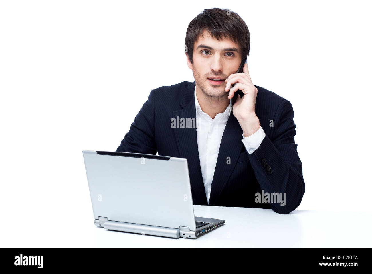 Laptop sitting on table Cut Out Stock Images & Pictures - Alamy