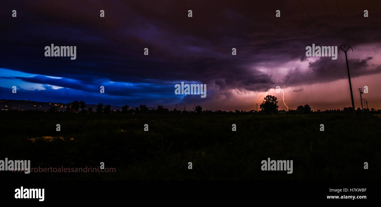 Storm at sunset Stock Photo - Alamy
