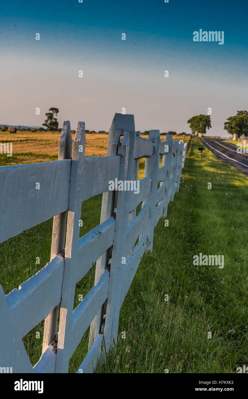 Trees fence field sky sunset fence hi-res stock photography and images ...