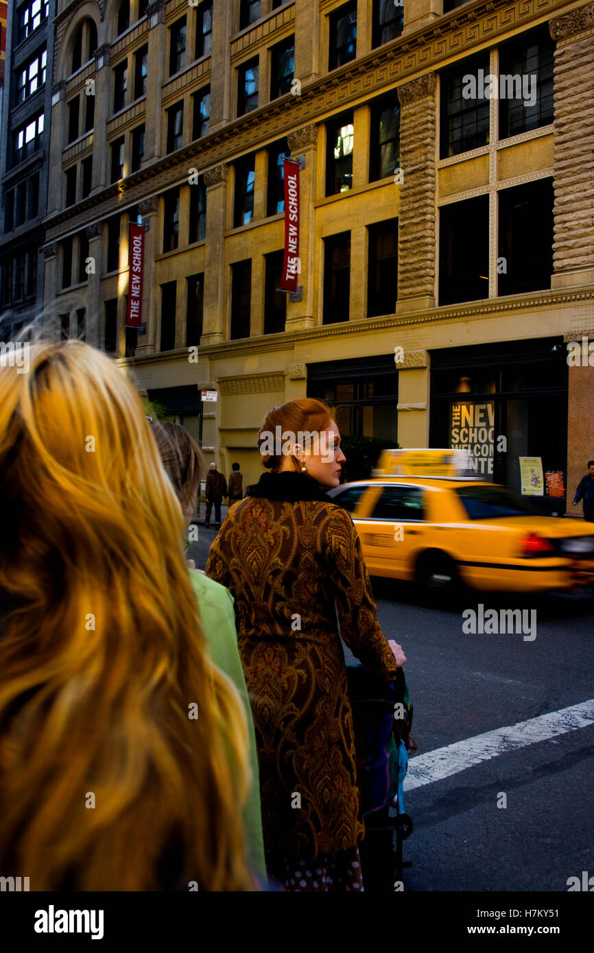 Womans crossing a street in New York City Stock Photo - Alamy
