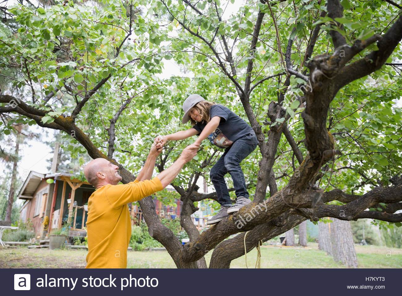 Father son standing side by side hi-res stock photography and images ...