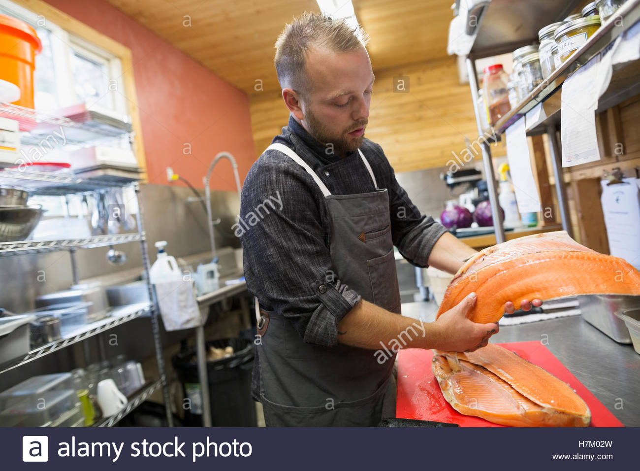 Salmon checking freshness of fish hi-res stock photography and images ...