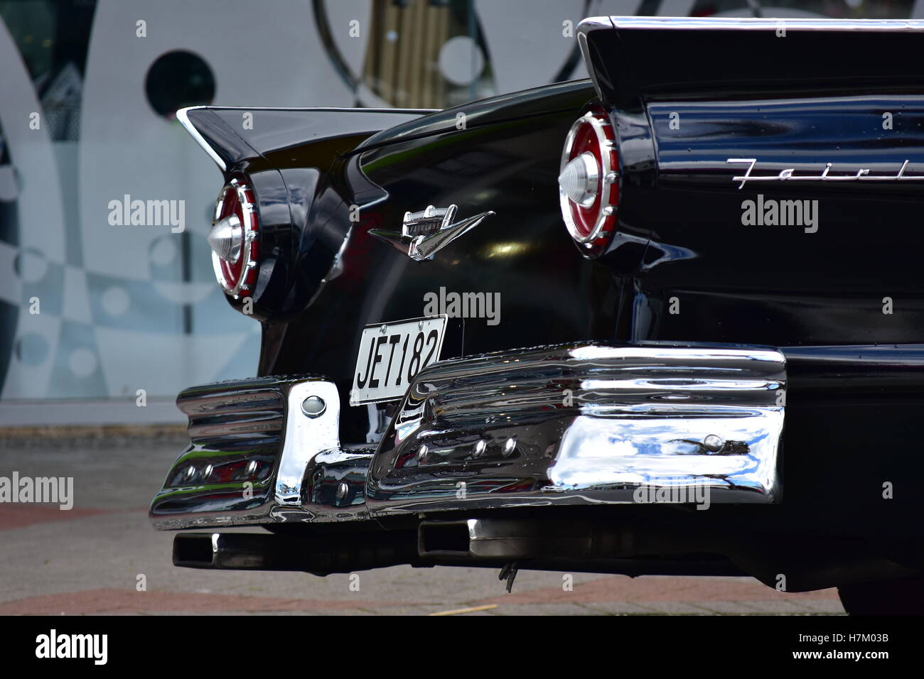Rear of black Ford Fairlane with chrome bumper Stock Photo - Alamy