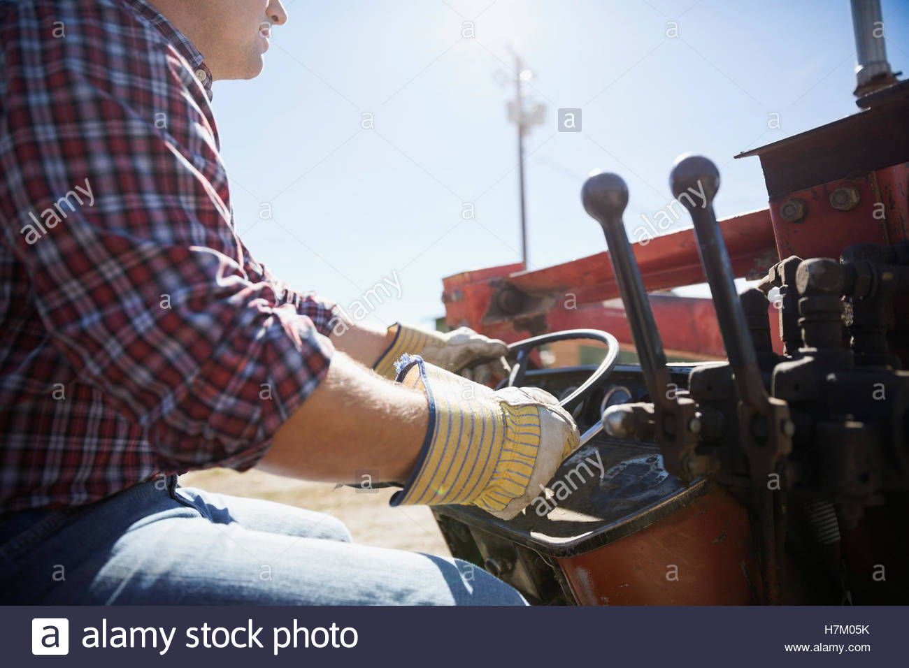 Person driving tractor hi-res stock photography and images - Alamy