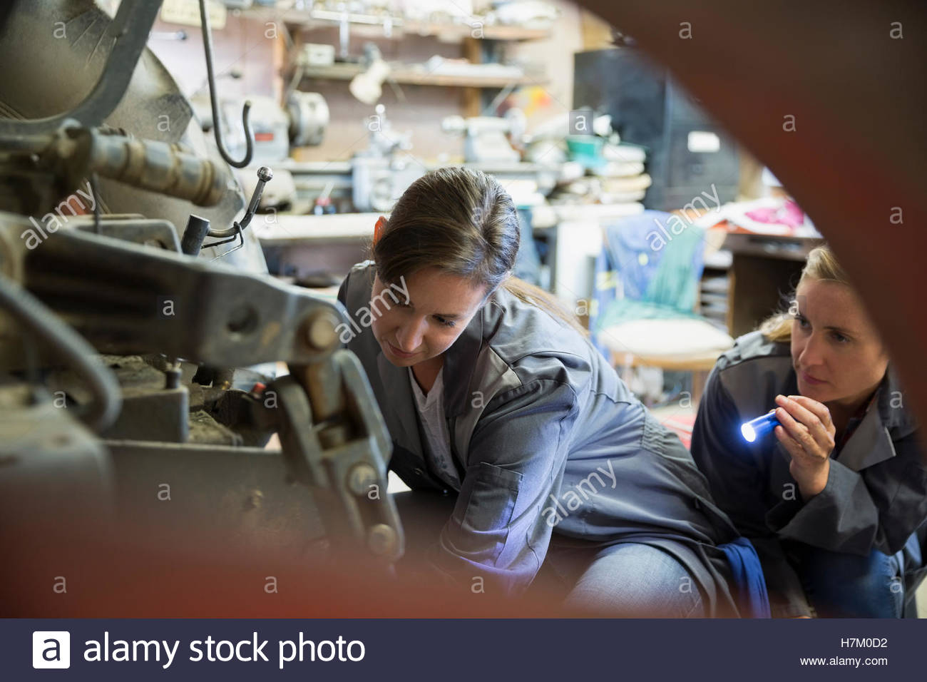 Working on tractor hi-res stock photography and images - Alamy