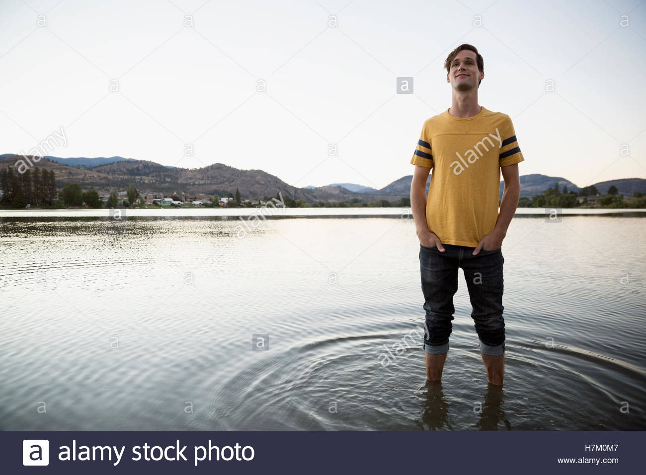 Man wading into water hi-res stock photography and images - Alamy